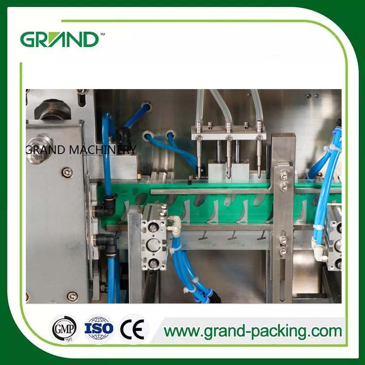 Mono Dose Liquid Filling And Sealing Machine - grand packing machine